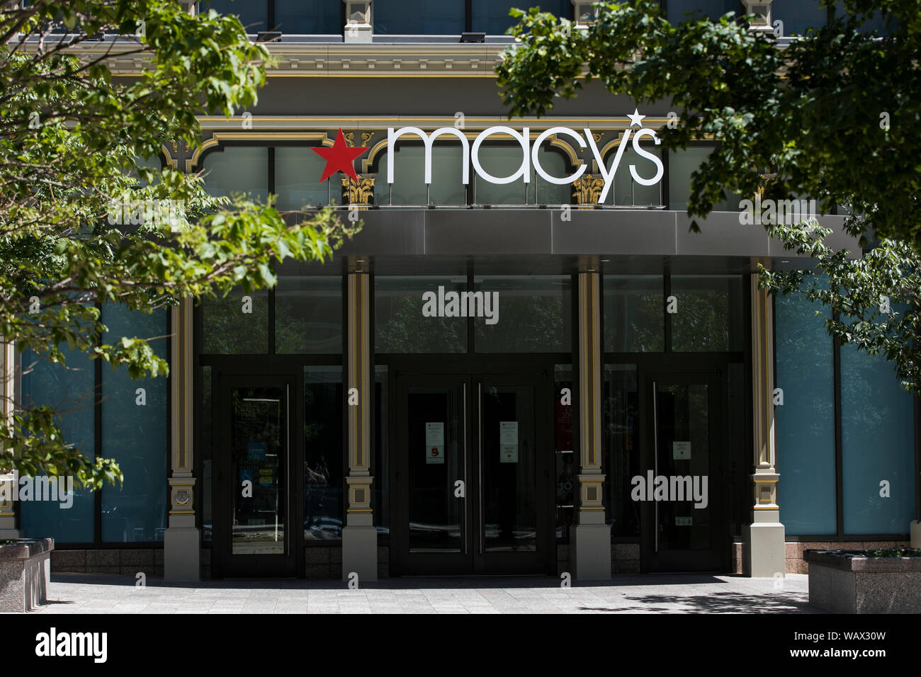 A logo sign outside of a Macy's retail store location in Salt Lake City ...