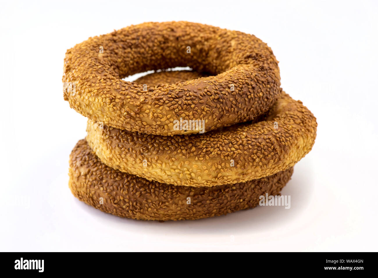 Simit Turkish bagel isolated on white background Stock Photo - Alamy