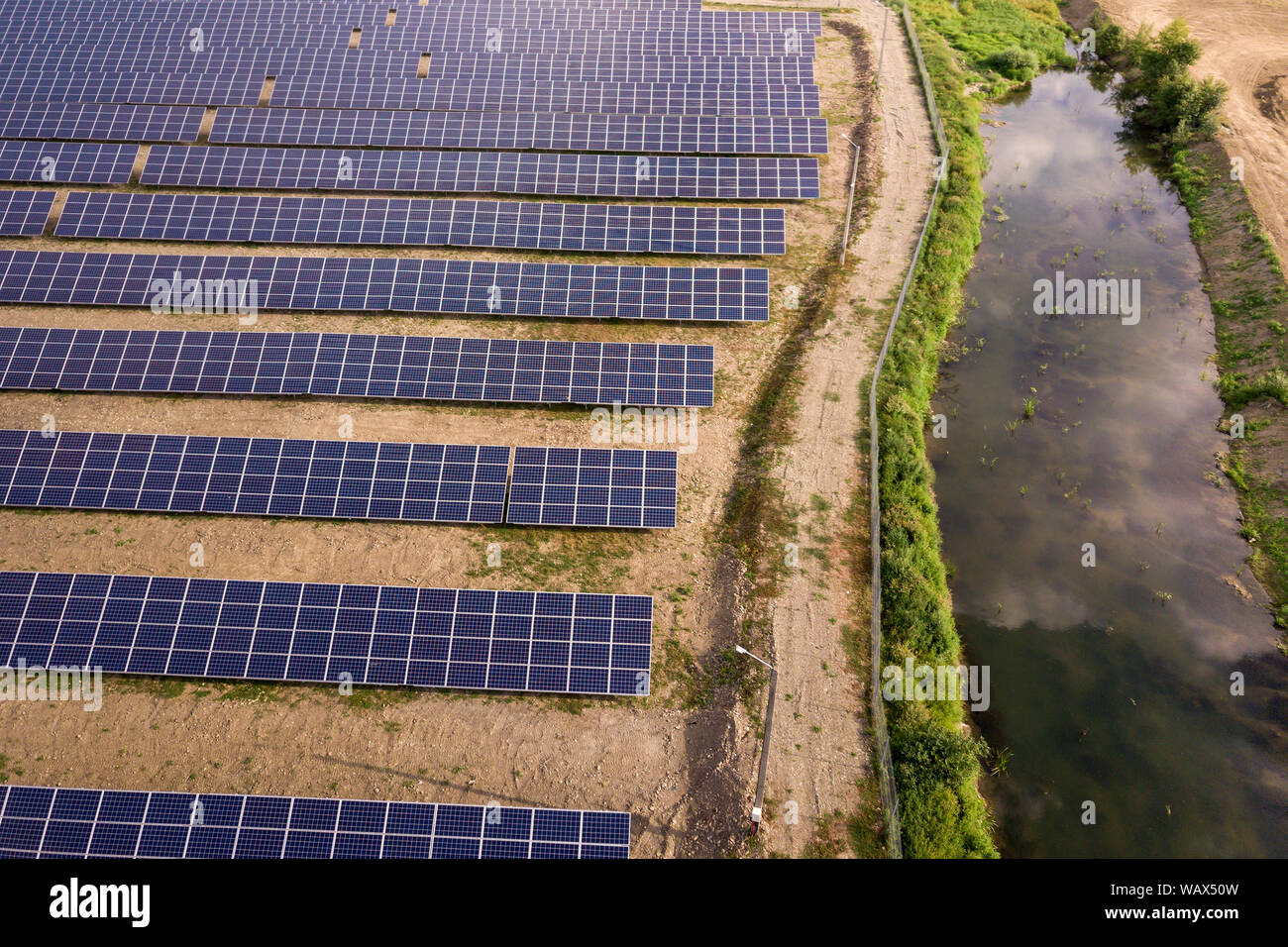 Aerial view of solar power plant. Electric panels for producing clean ...