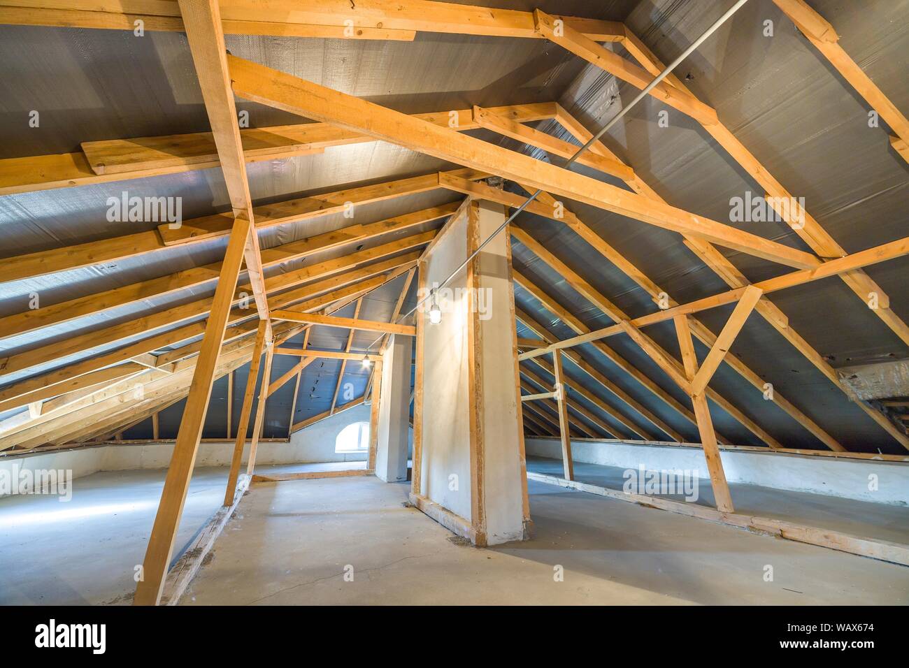 Attic of a building with wooden beams of a roof structure Stock Photo ...