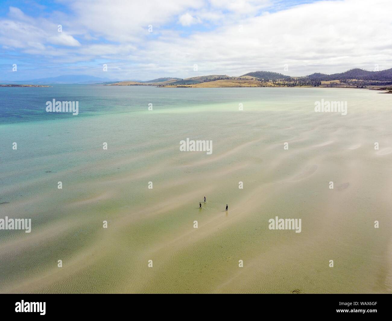 Beautiful wide distant shot of the ocean under a clear sky in Exuma ...
