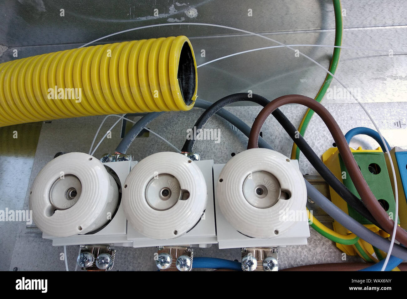 Electric wires and switches in a fuse box Stock Photo - Alamy