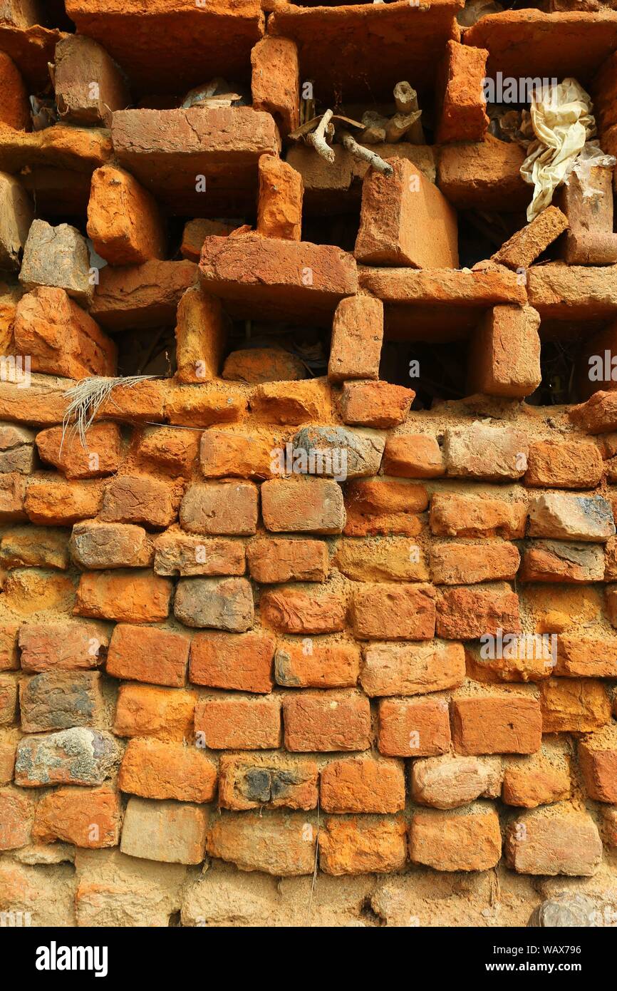 Old orange and red breakable brick arch wall with pattern Stock Photo ...