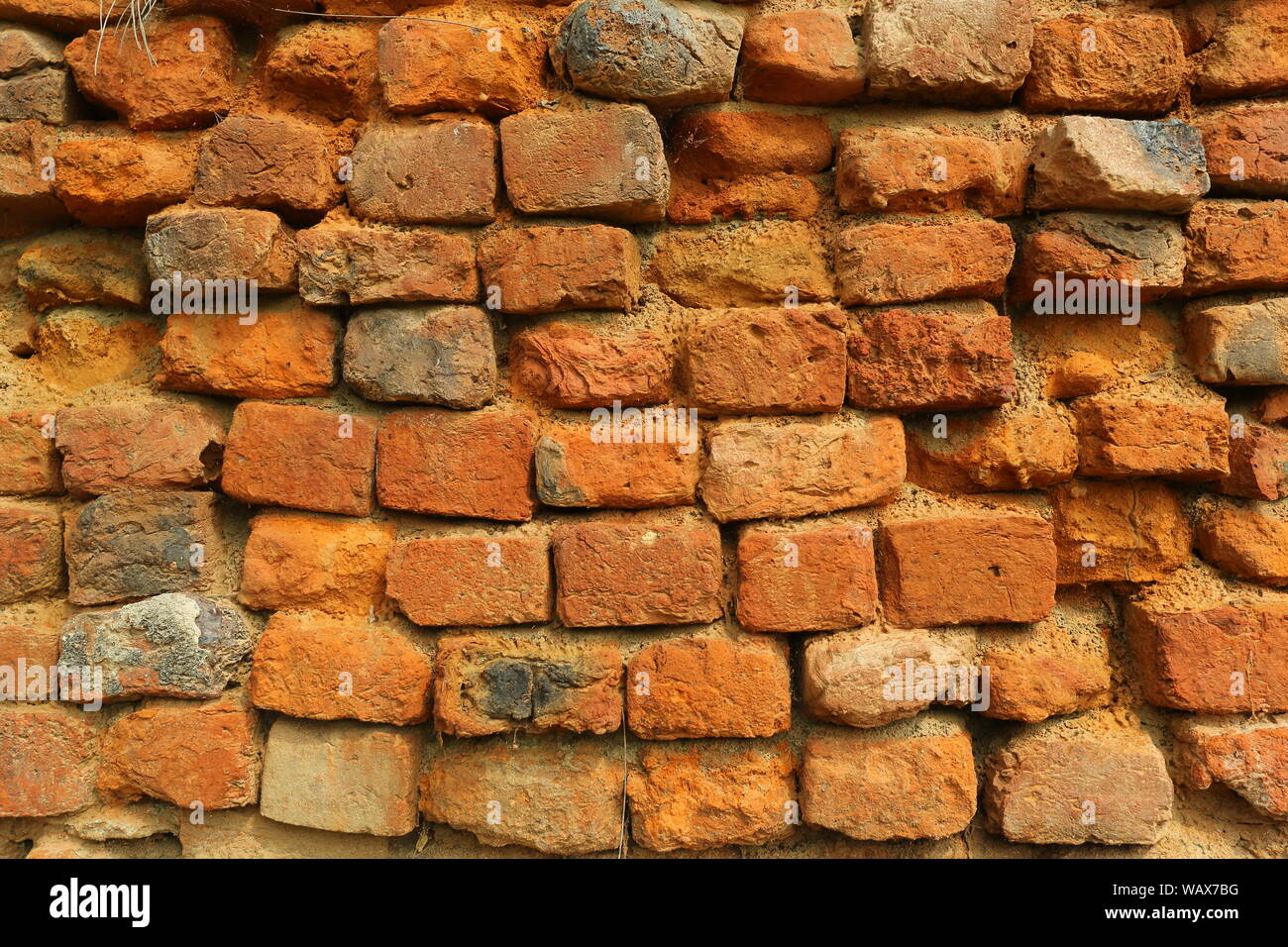 Old orange and red breakable brick arch wall with pattern Stock Photo ...