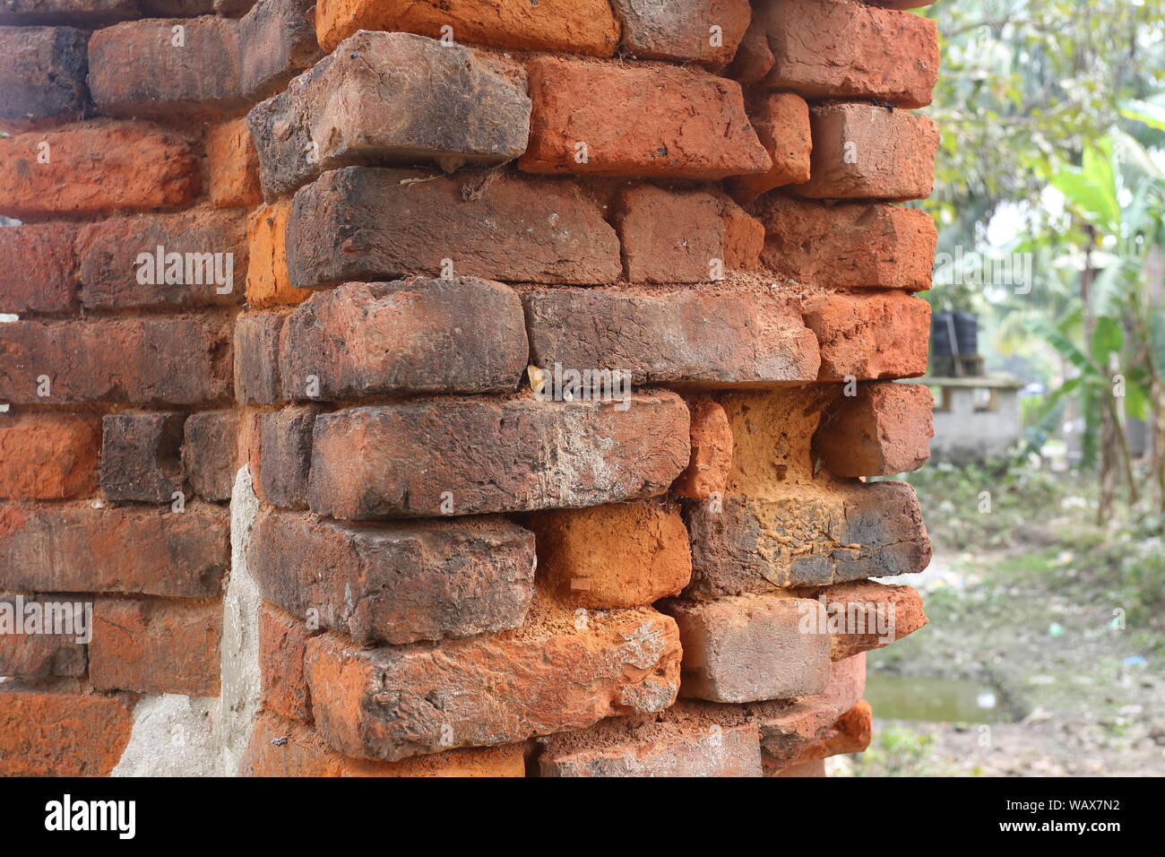 Old orange and red breakable brick arch wall with pattern Stock Photo ...