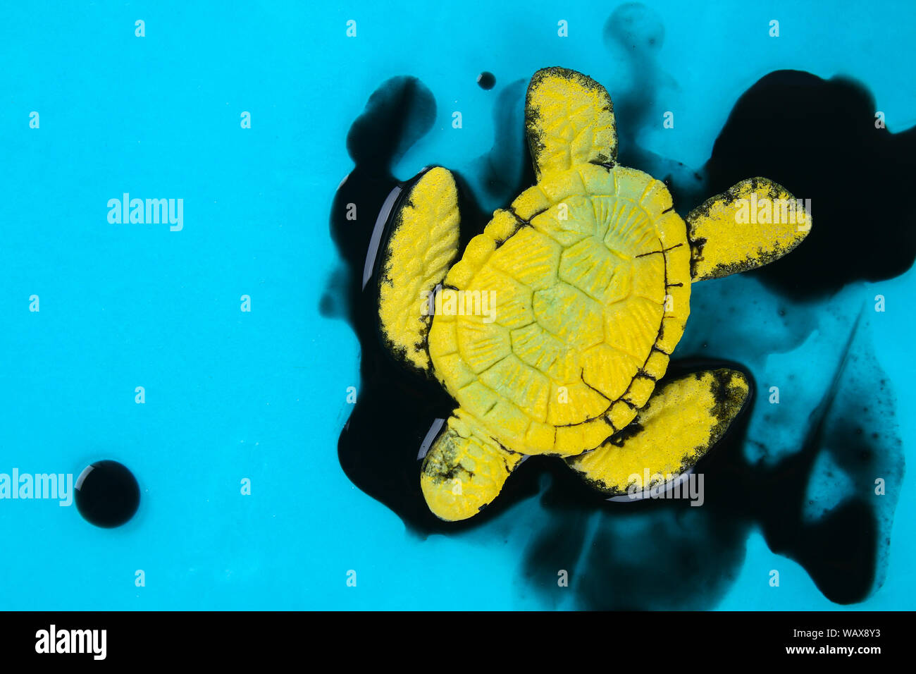 Turtle in oil. pollution in ocean environmental problem. Ecological ...