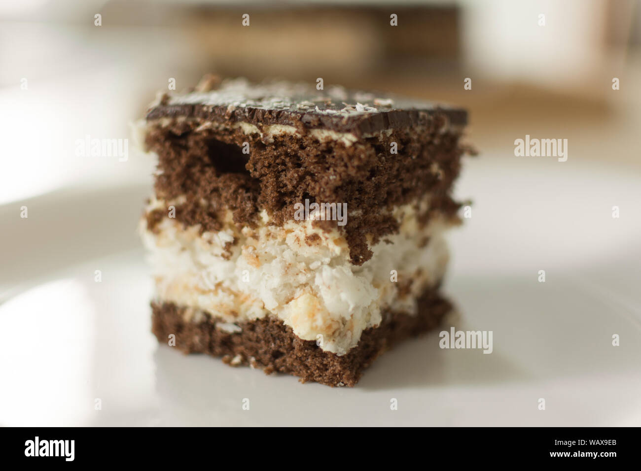 Chocolate cut cake top view. Sweet chocolate pie Stock Photo - Alamy