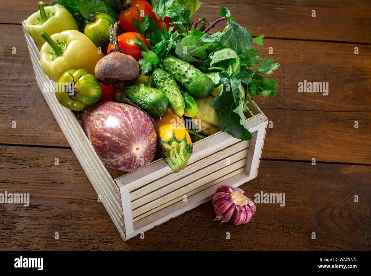 Wooden box with different vegetables. Harvesting concept Stock Photo ...