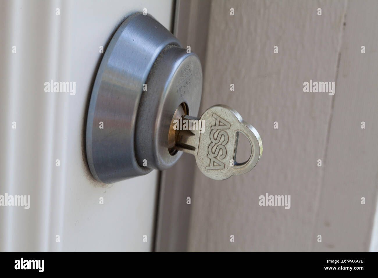 Key into lock hi-res stock photography and images - Alamy