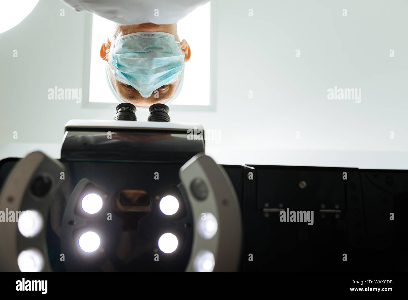 Low angle of a skilled male doctor at work Stock Photo - Alamy