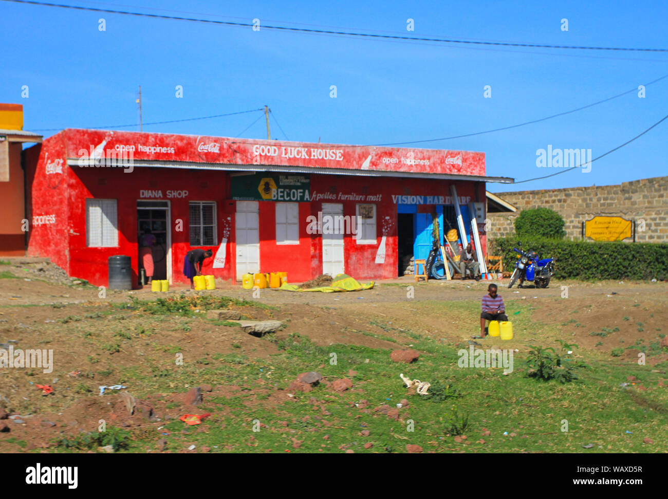 Small shops at side of road, Kenya, Africa. Local people outside ...