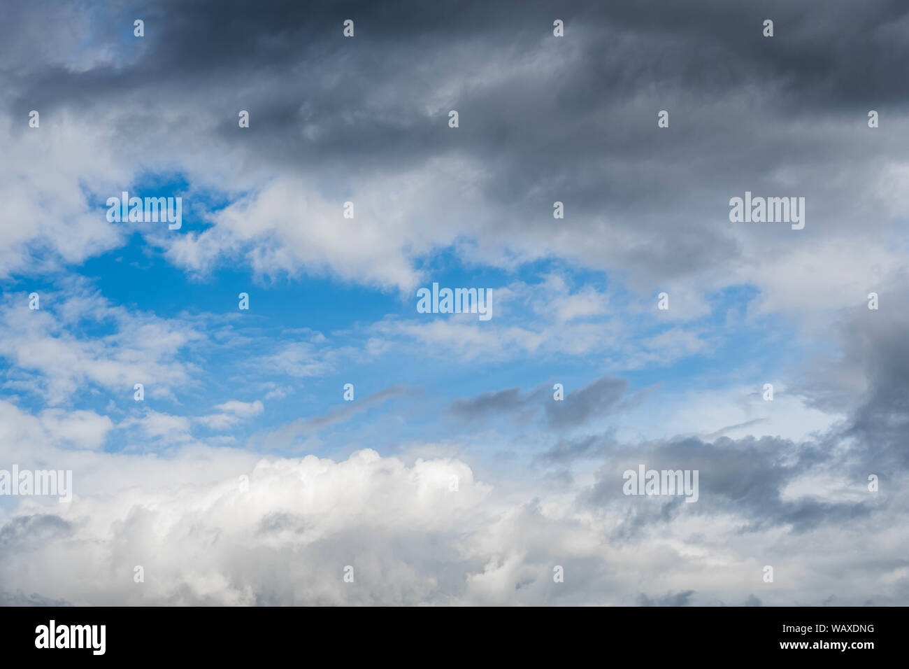 Clouds near sunset before rain blue sky Stock Photo - Alamy