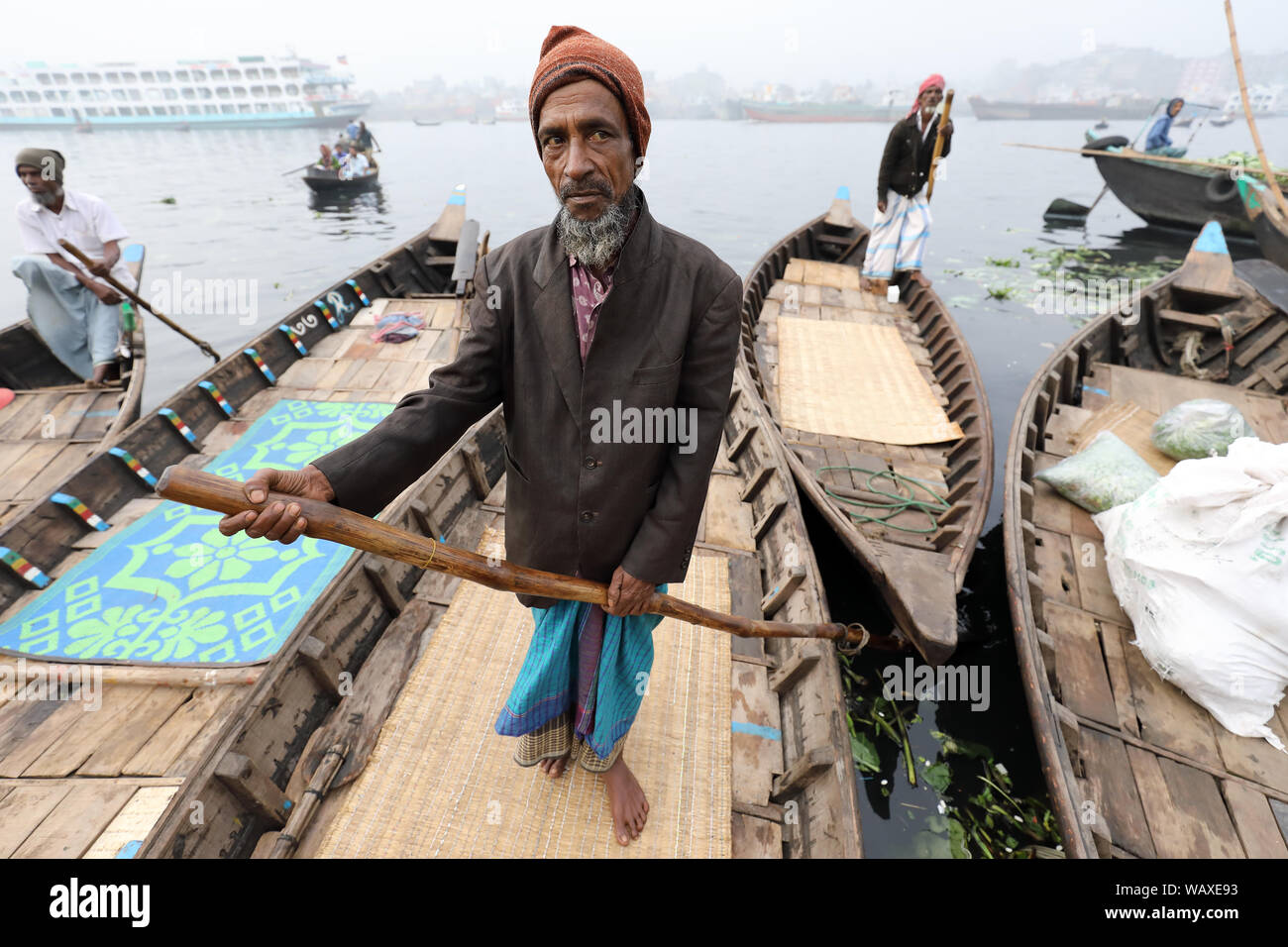Ship and country boat in river dhaka bangladesh hi-res stock ...