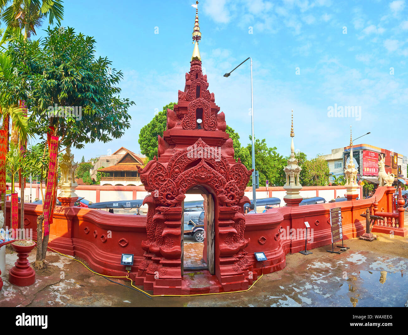 CHIANG MAI, THAILAND - MAY 2, 2019: Dark red gate of Wat Phan Tao ...