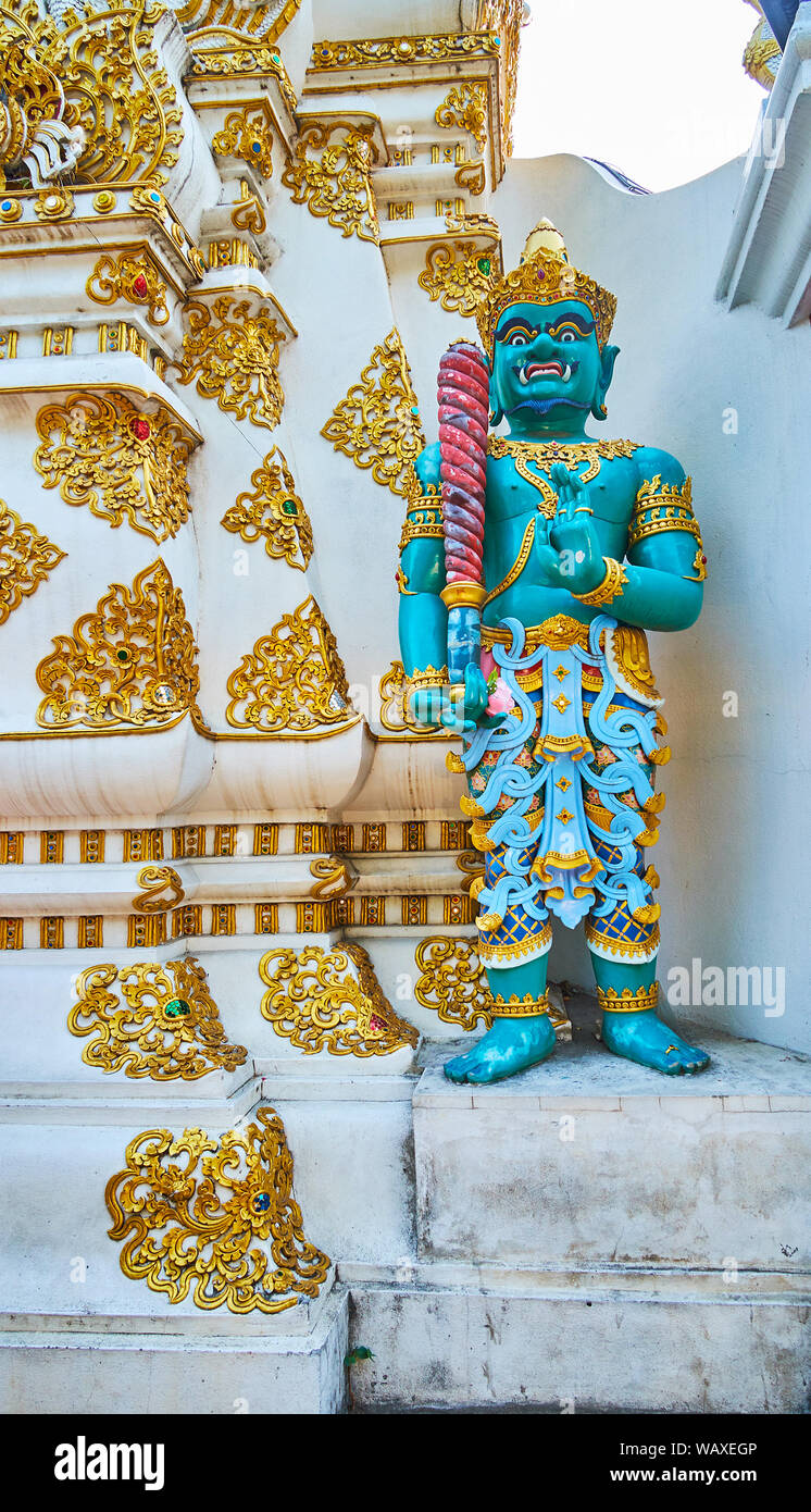 The scultpure of Yaksha mythical creature, holding club and guarding ...