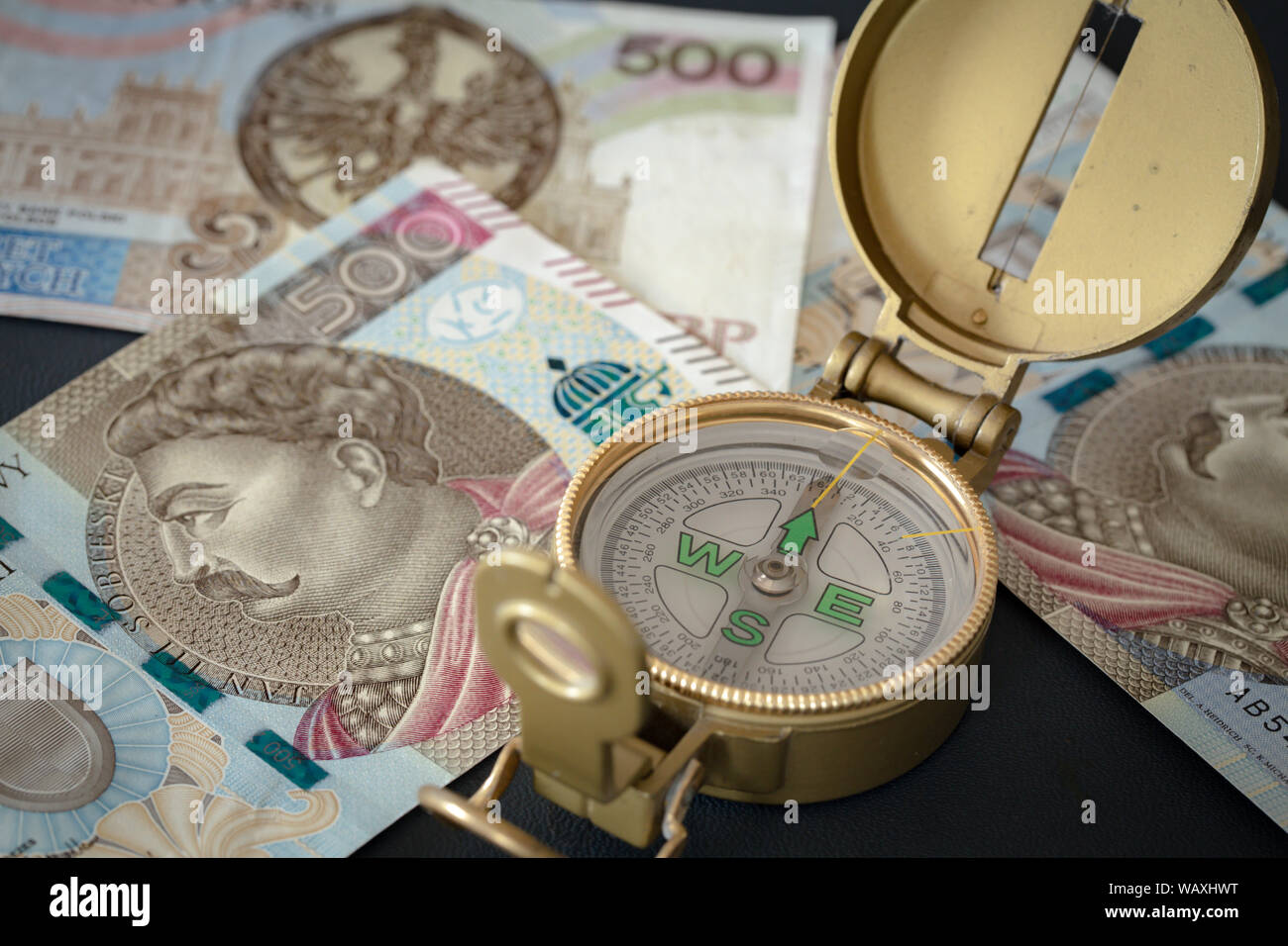 Polish money, 500 zloty with an old compass / business concept Stock ...