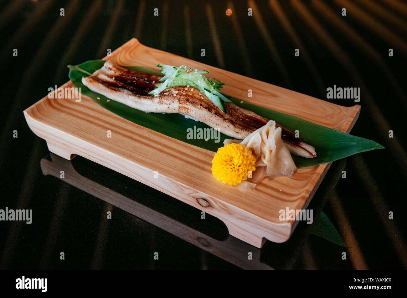Premium Unagi sushi on wood plate, whole large piece Japanese Unagi eel ...