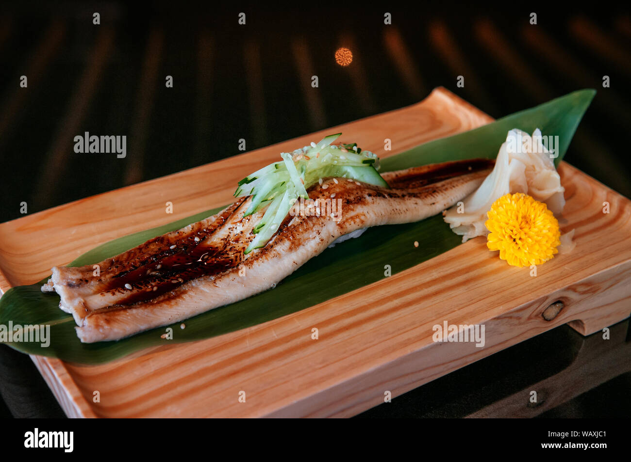 Premium Unagi sushi on wood plate, whole large piece Japanese Unagi eel ...