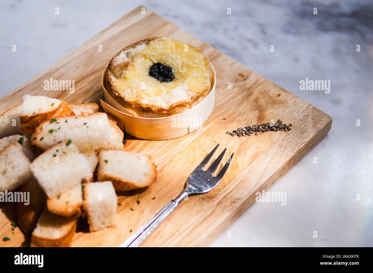 Brie cheese with toasted bread Stock Photo - Alamy