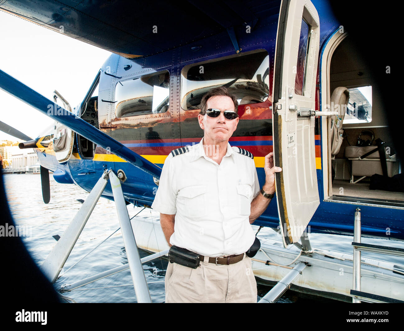 Seaplane crew member awaiting boarding Stock Photo - Alamy