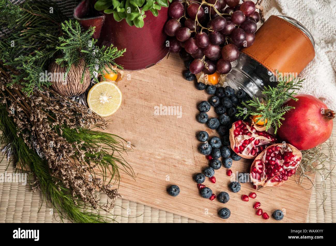 Healthy eating theme with different kind of fruits on wooden background ...