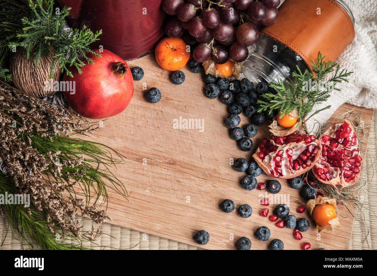 Healthy eating theme with different kind of fruits on wooden background ...
