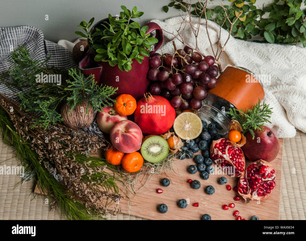 Healthy eating theme with different kind of fruits on wooden background ...