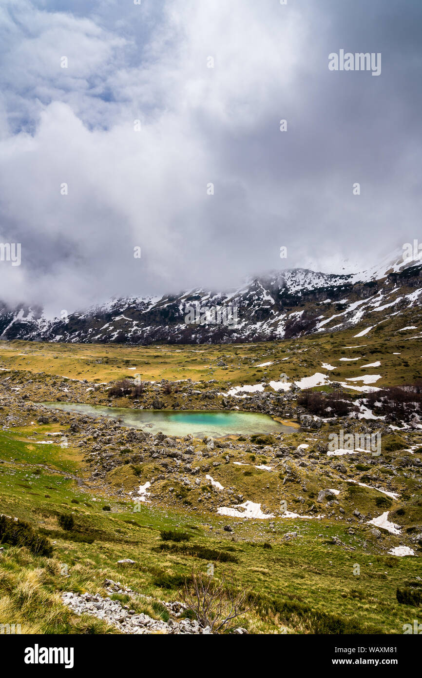 Montenegro, Azure blue clear waters of mountain lake valovito jezero in ...