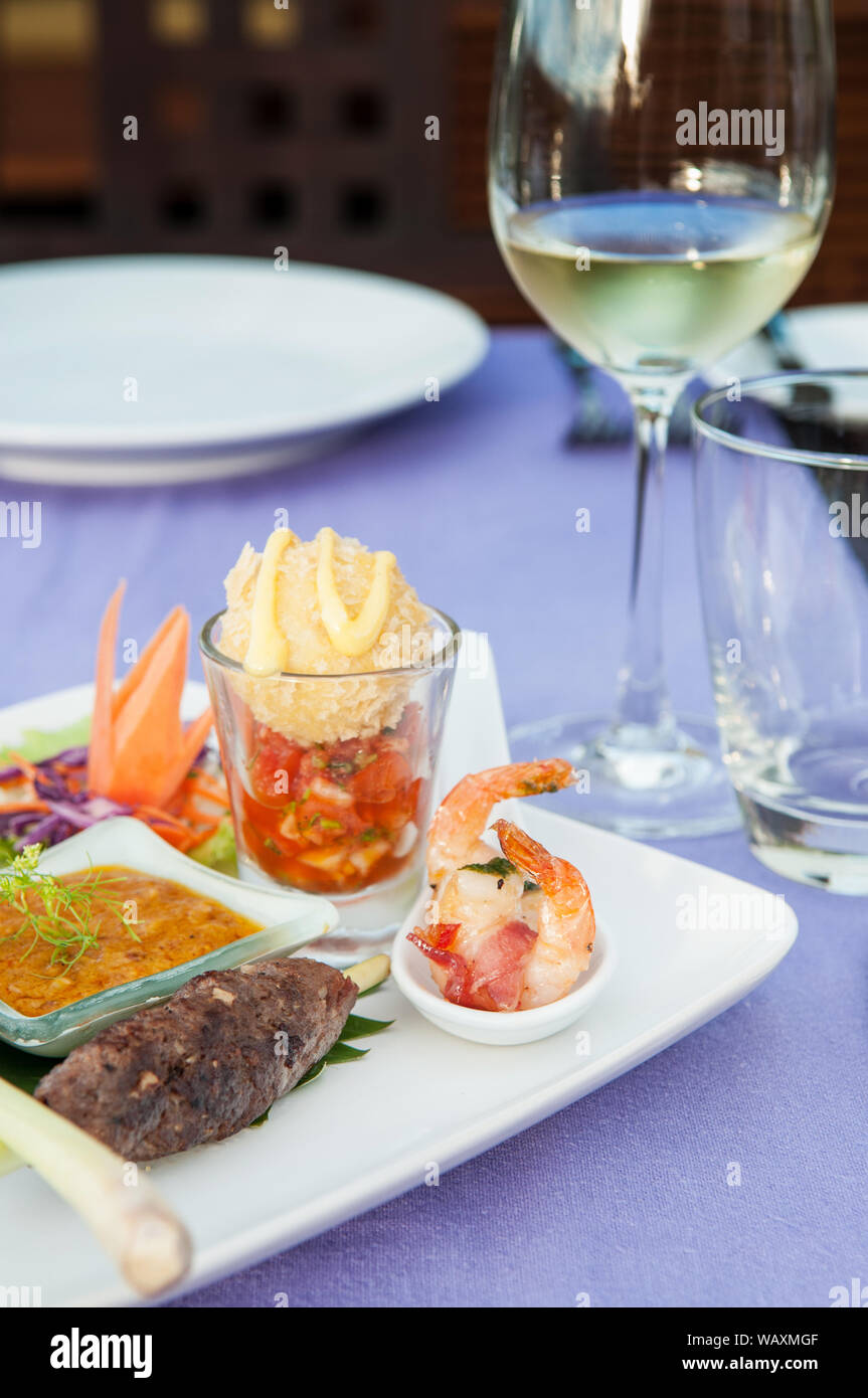 Beef Satay skewer appetizer canape and peanut sauce Stock Photo - Alamy
