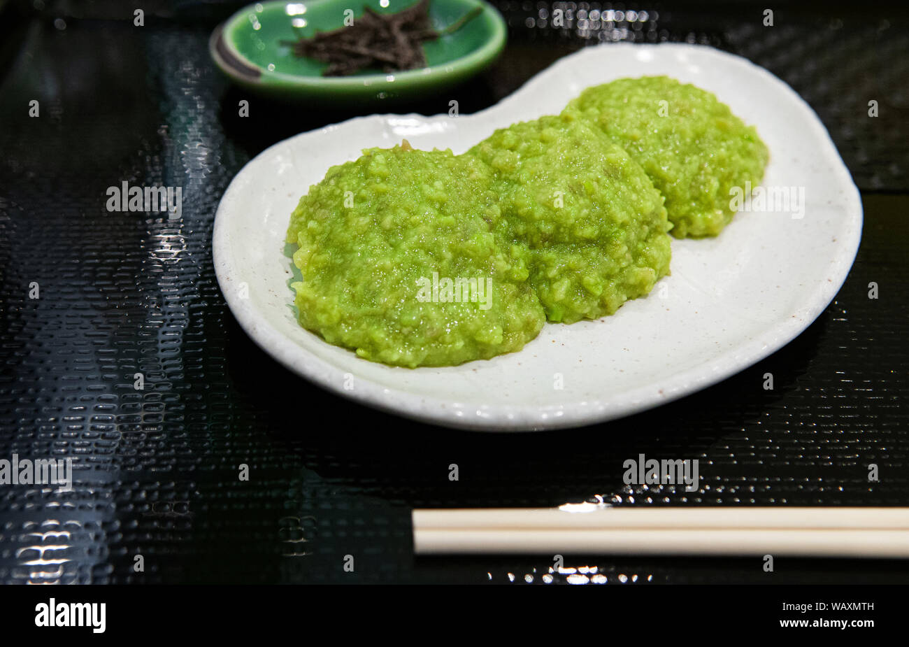 Zunda mochi or Mochi with green soybeans paste served with salted ...
