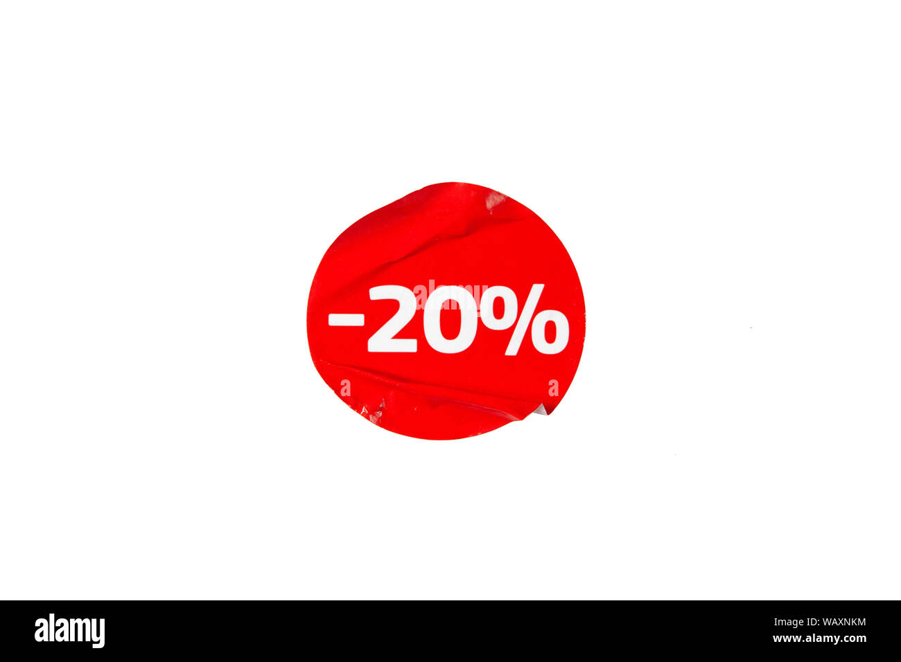 Round crumpled red sticker discount on a white background is isolated ...