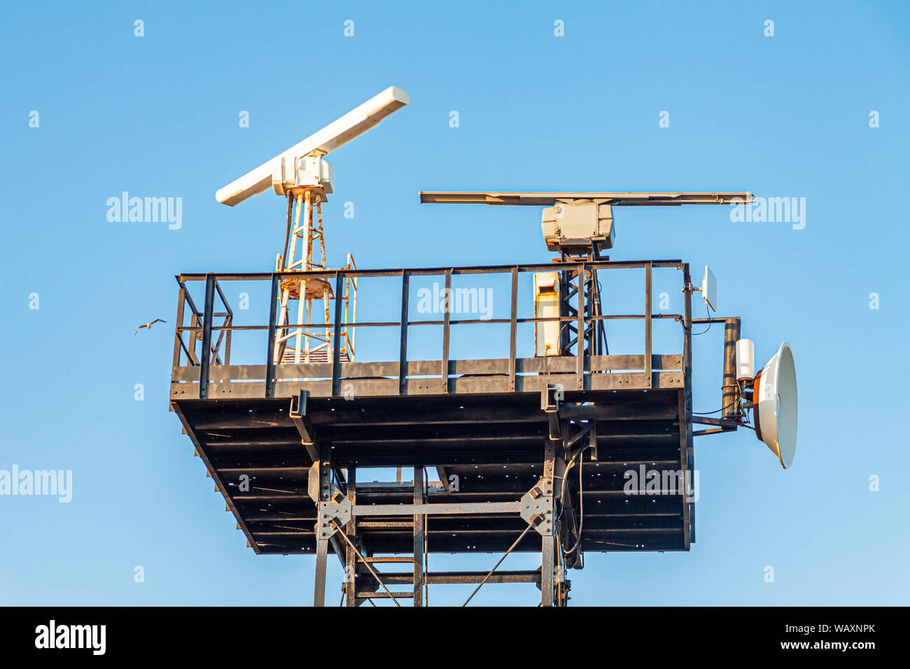 Military coastal radar stations. Against the background of blue sky ...