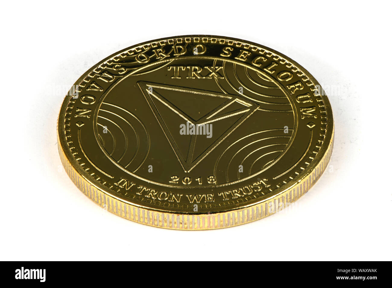 Back side of the crypto currency golden tron isolated on white ...