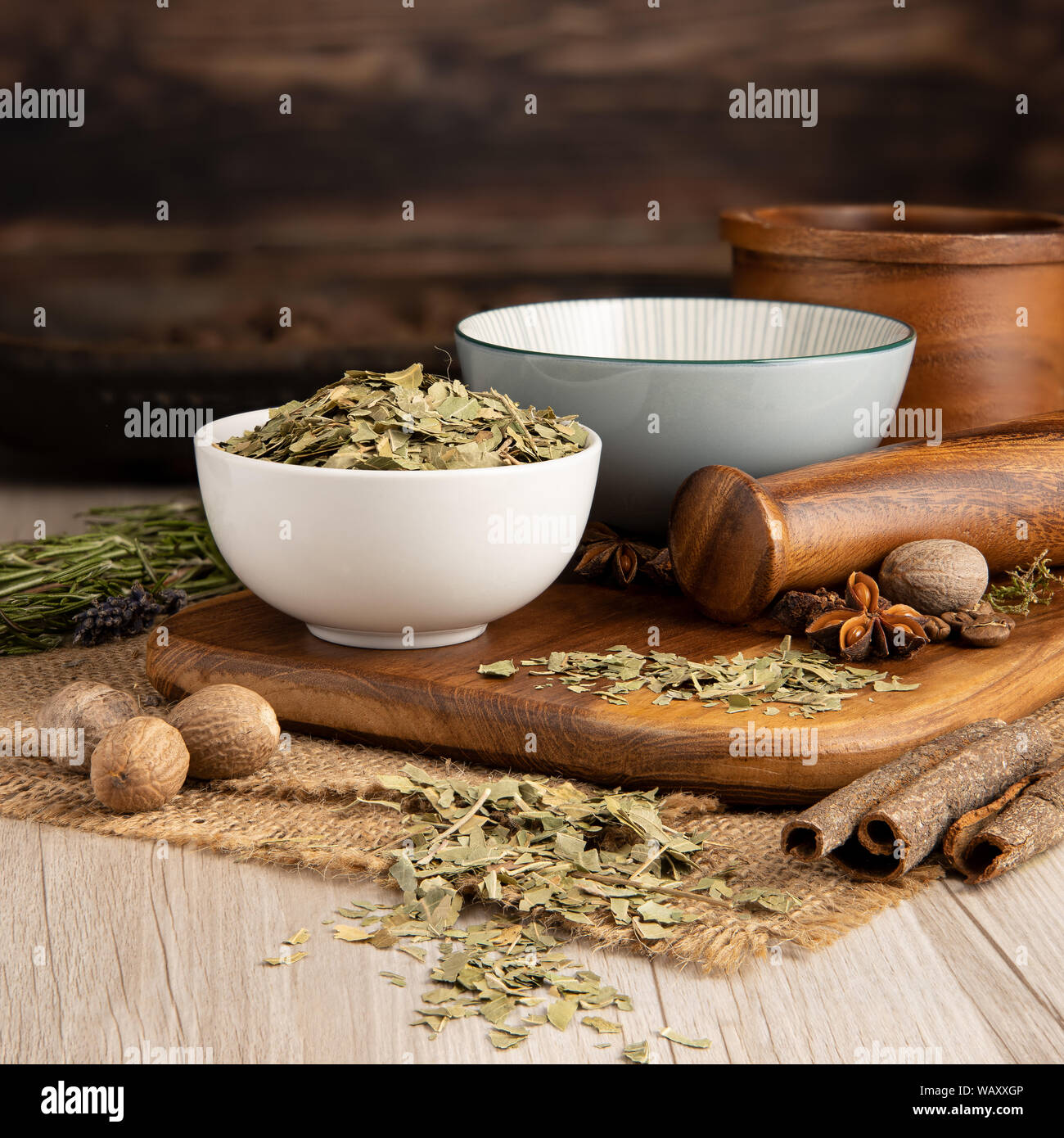 Dried Neem Leaf in a bowl and food preparation and kitchen setting ...