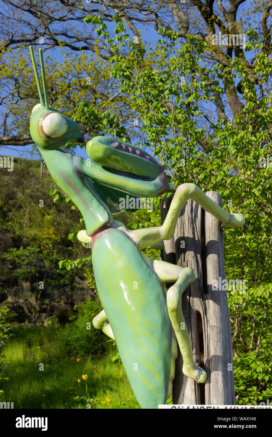 Closeup of Plastic Foam-made Praying mantis insect carnivore sculpture ...