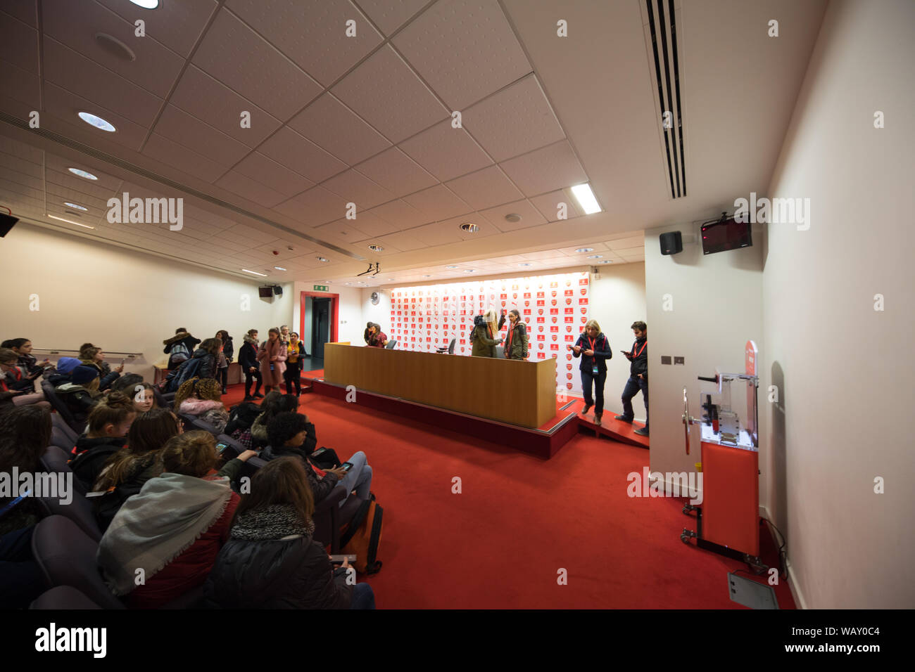 Visiting In front of the Emirates Stadium in London, UK showing the ...