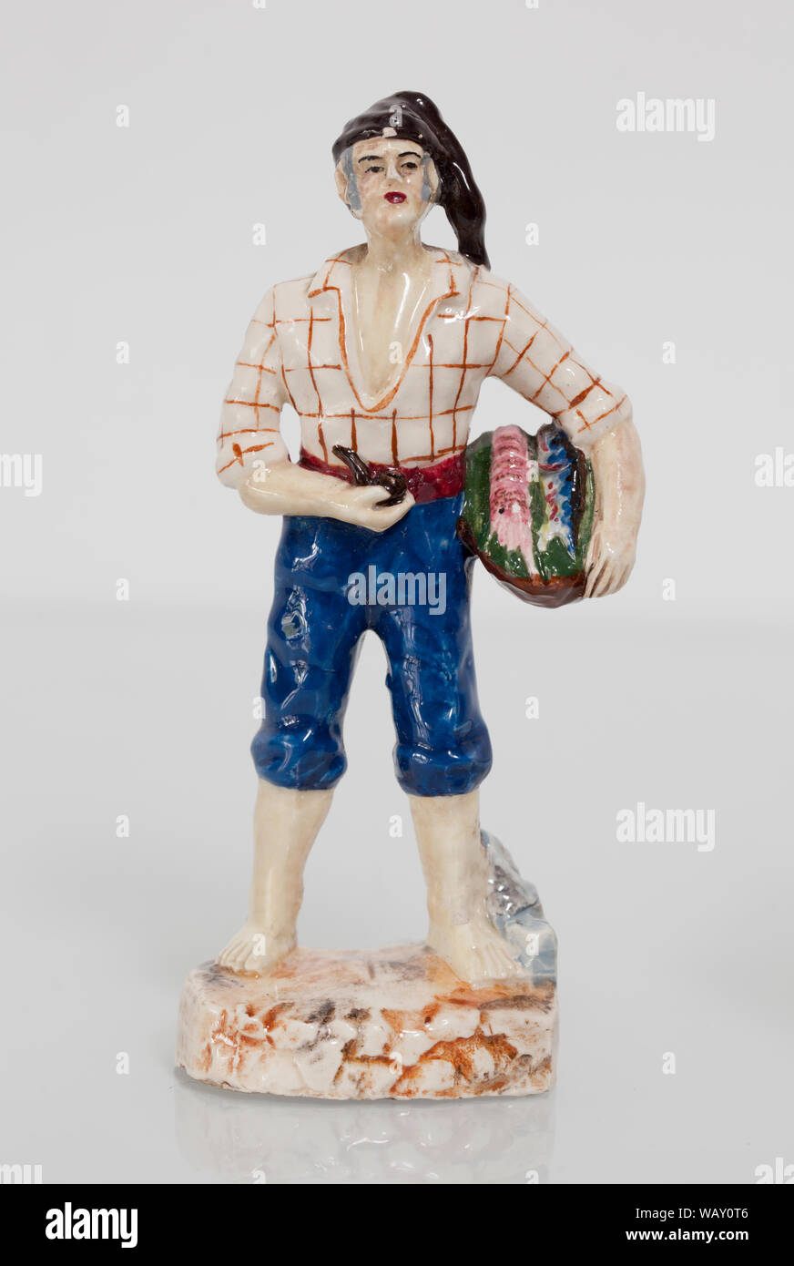 Vintage Ceramic Figure of Fisherman by Devauassoux Stock Photo - Alamy