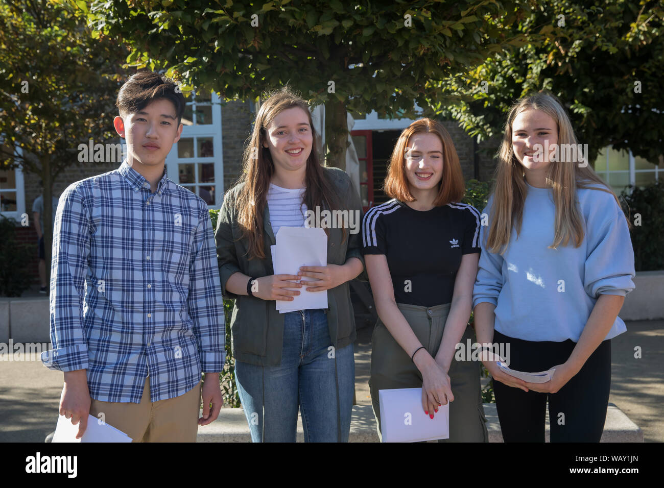 Pose with their gcse results hi-res stock photography and images - Alamy