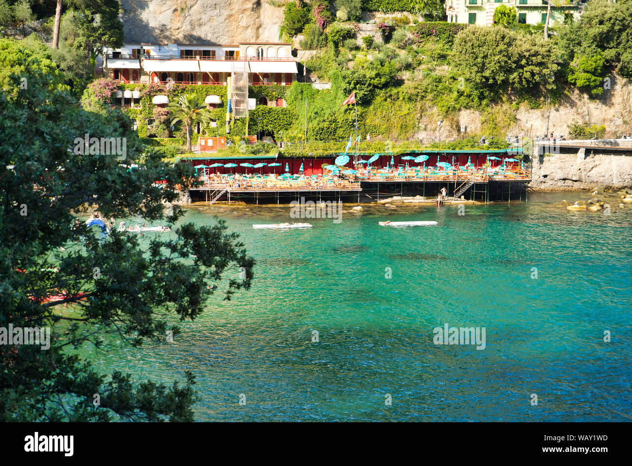 PARAGGI, LIGURIA, ITALY - AUGUST 15, 2019: Sandy Paraggi beach between ...