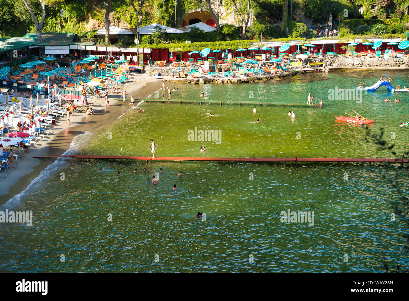 PARAGGI, LIGURIA, ITALY - AUGUST 15, 2019: Sandy Paraggi beach between ...