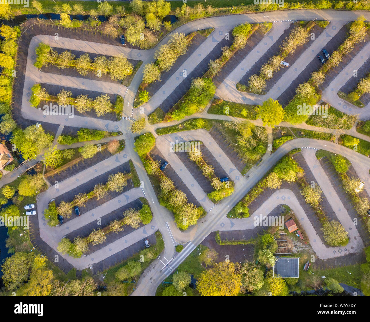 Ecological Parking lot seen from above. Combining nature and logistics ...