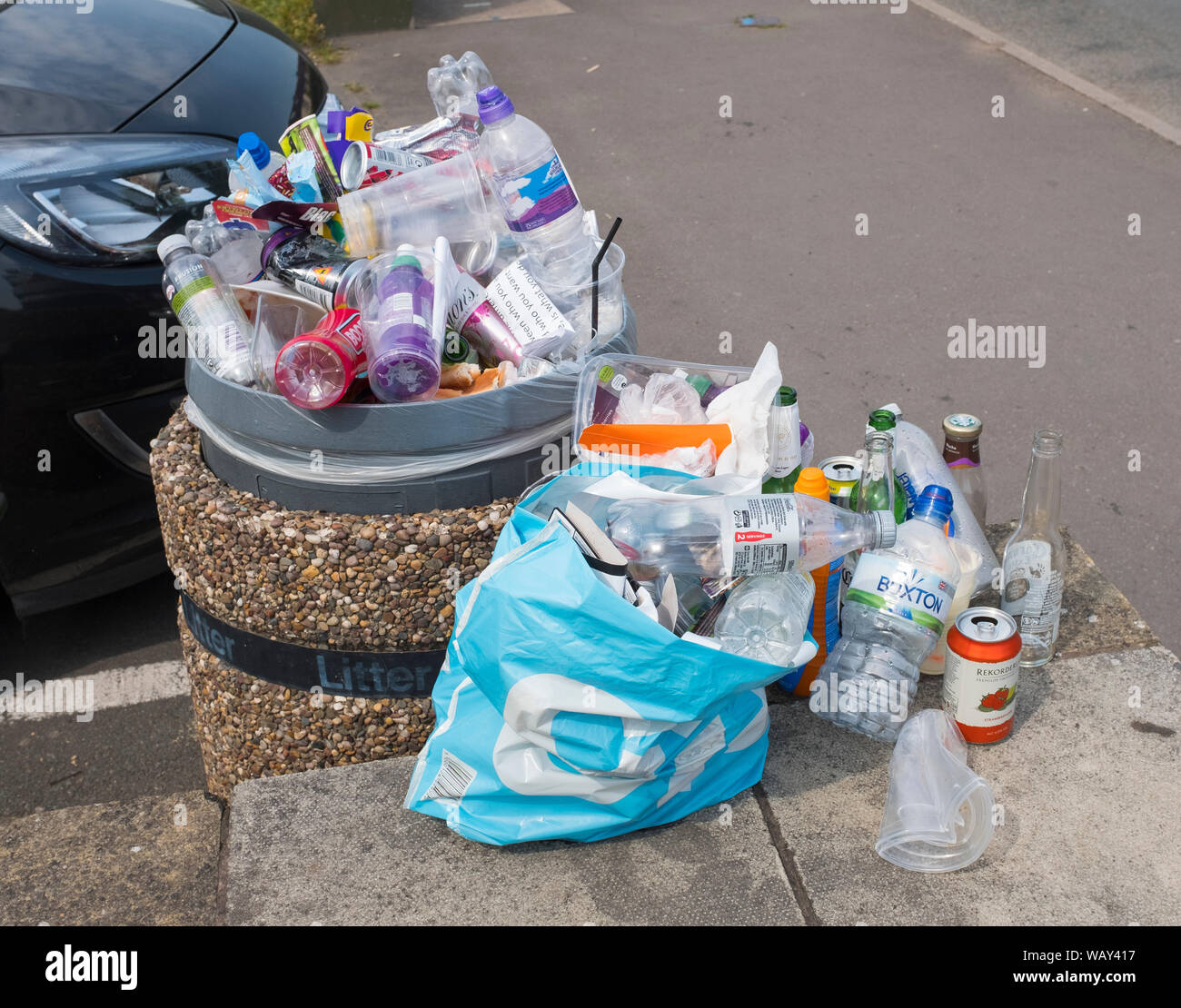 Overflowing litter bin at Shifnal carnival, Shropshire, England, UK ...
