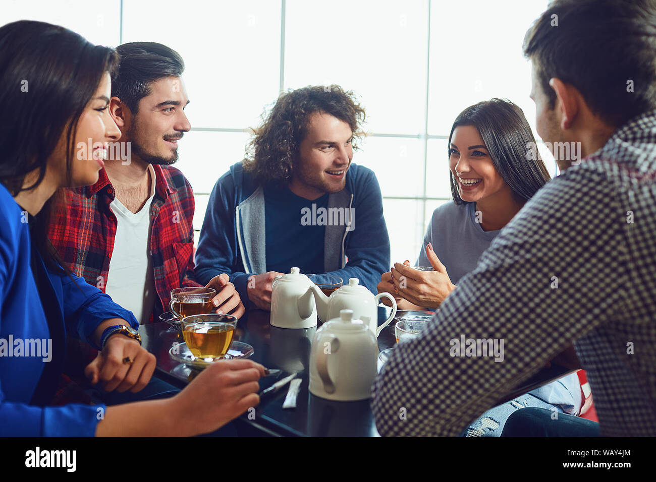 Young people communicate in hi-res stock photography and images - Alamy