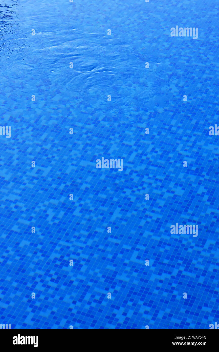 Texture of blue swimming pool water and ceramics Stock Photo - Alamy