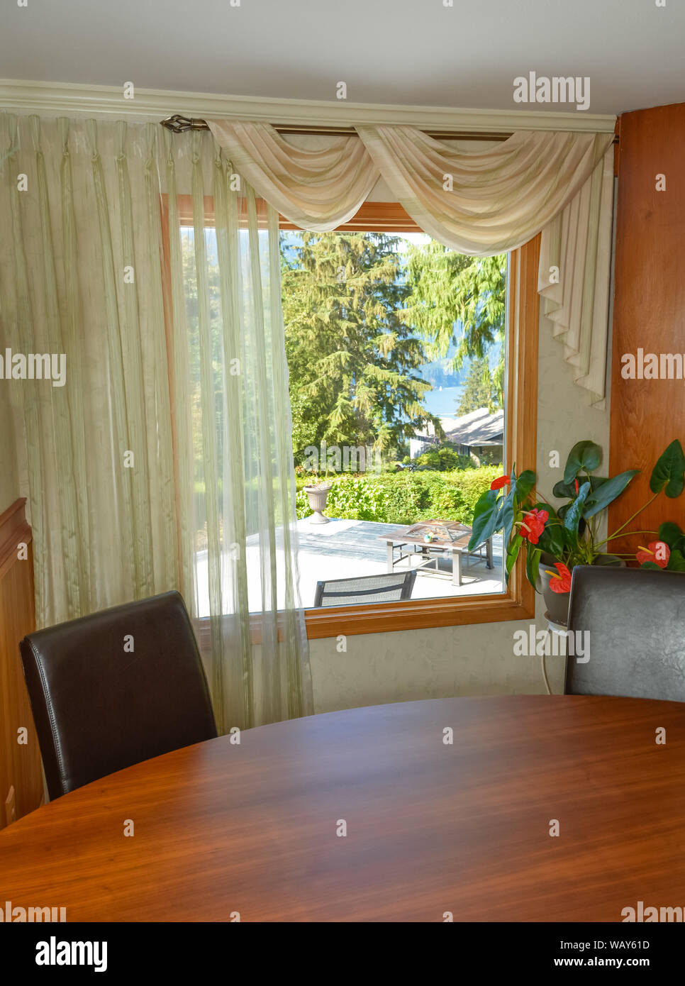 Interior of luxury residential house with scenery view through the ...