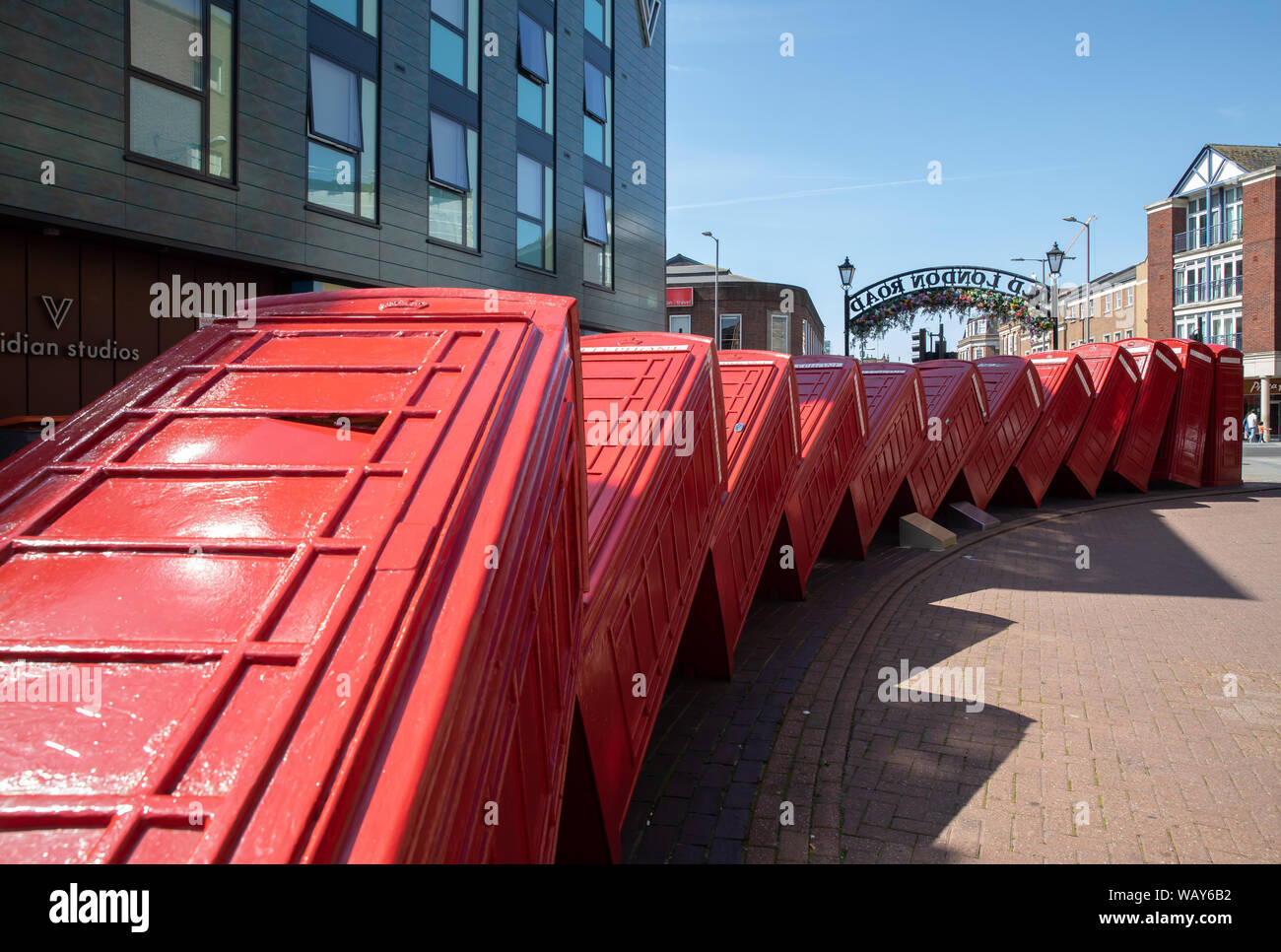 12 telephone boxes toppled over like dominoes is symbolic of Kingston ...