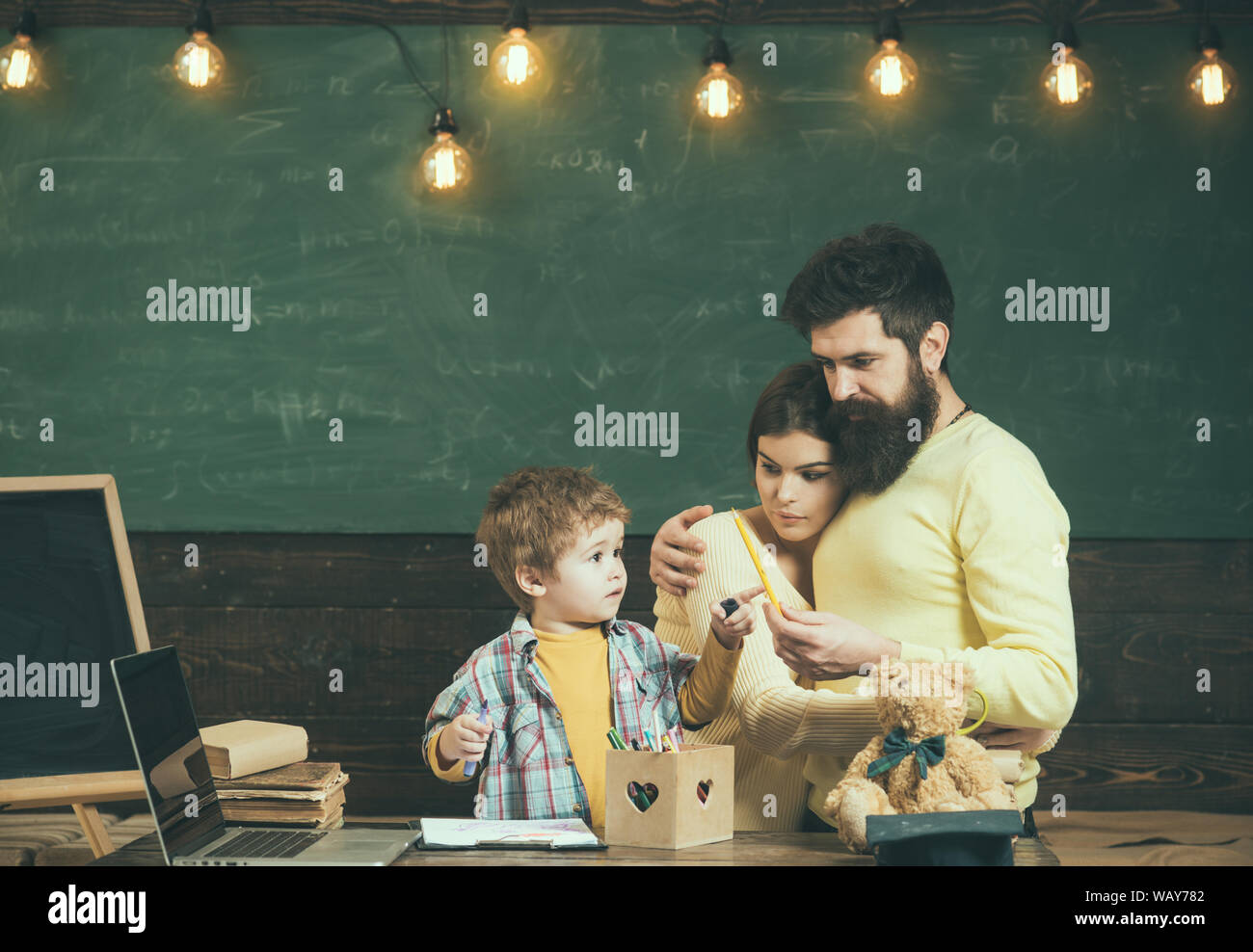 Mother teach child write hi-res stock photography and images - Alamy