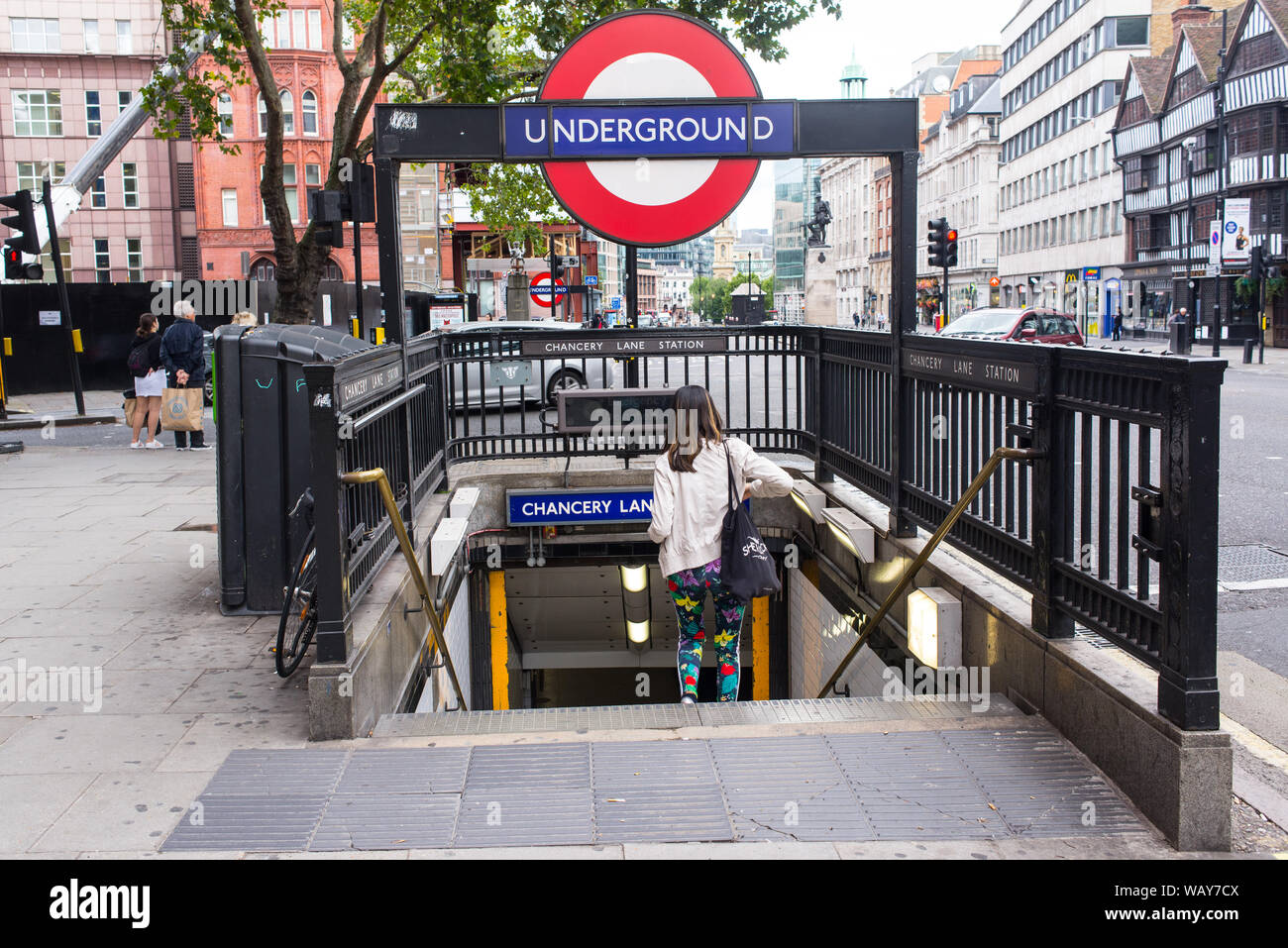 London, UK - August 2019: Woman entering London Underground at the ...