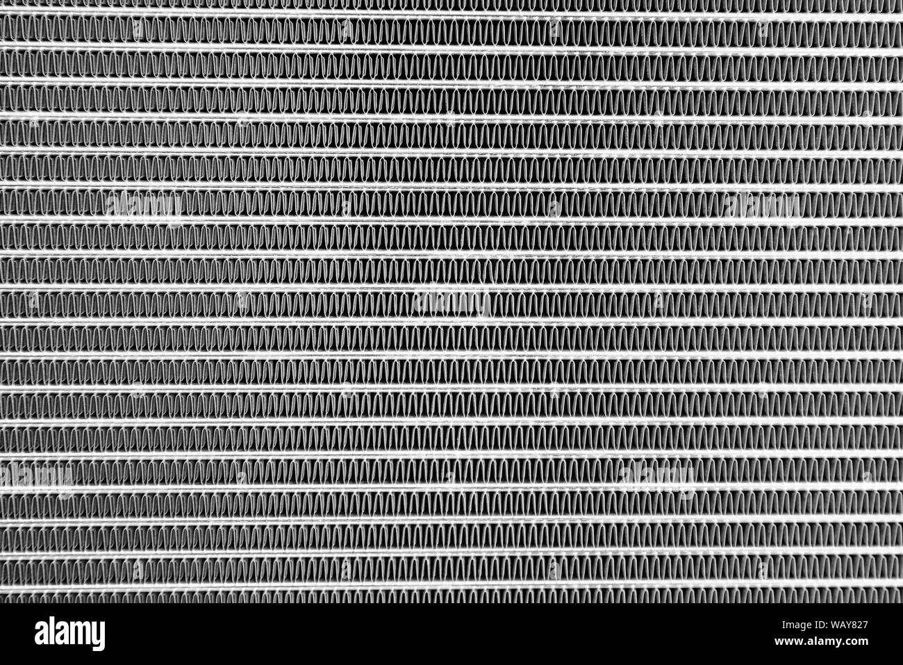 macro shot of part of a new cooling radiator with tubes and diffusion ...