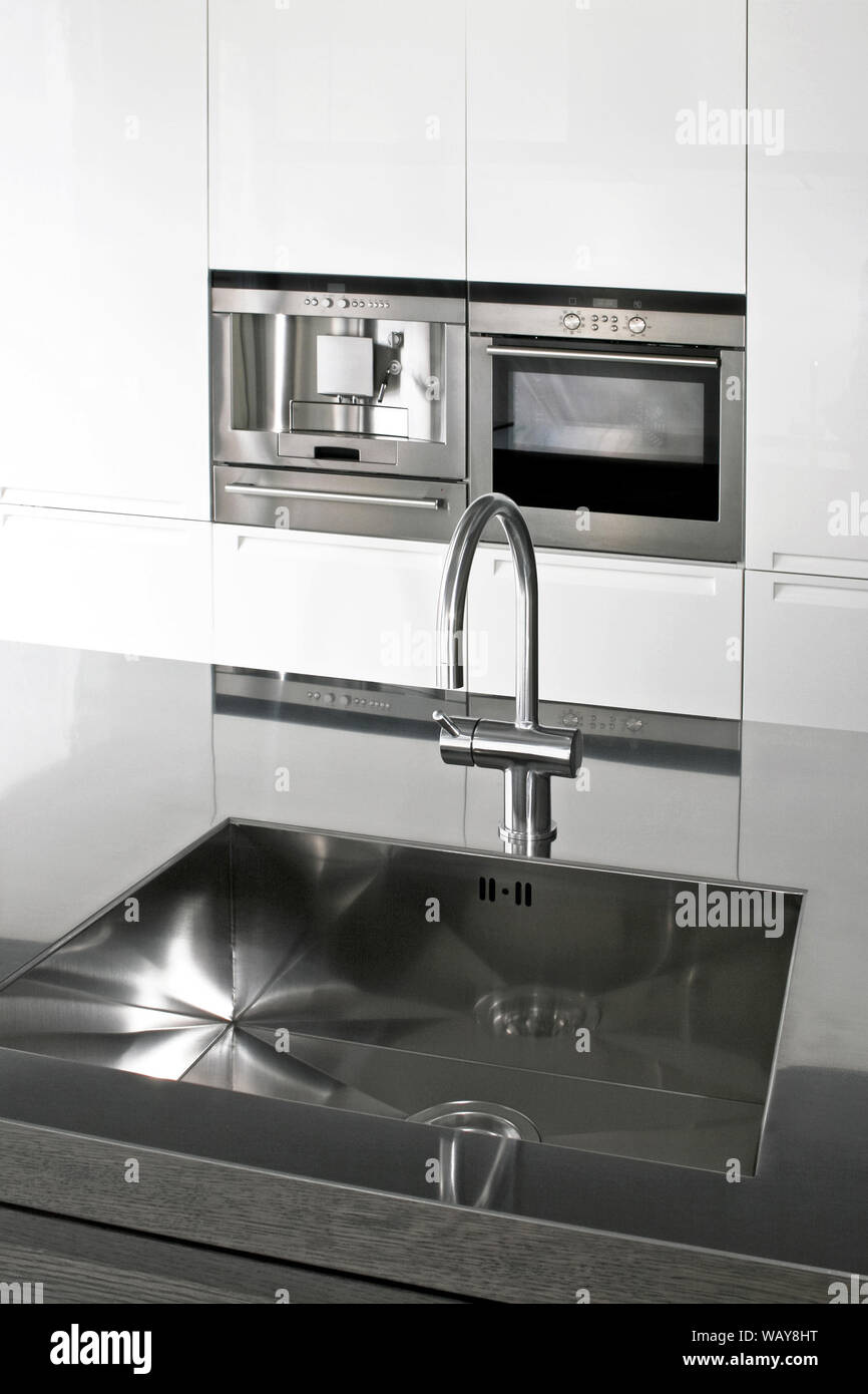 Interior of modern kitchen with counter sink Stock Photo - Alamy